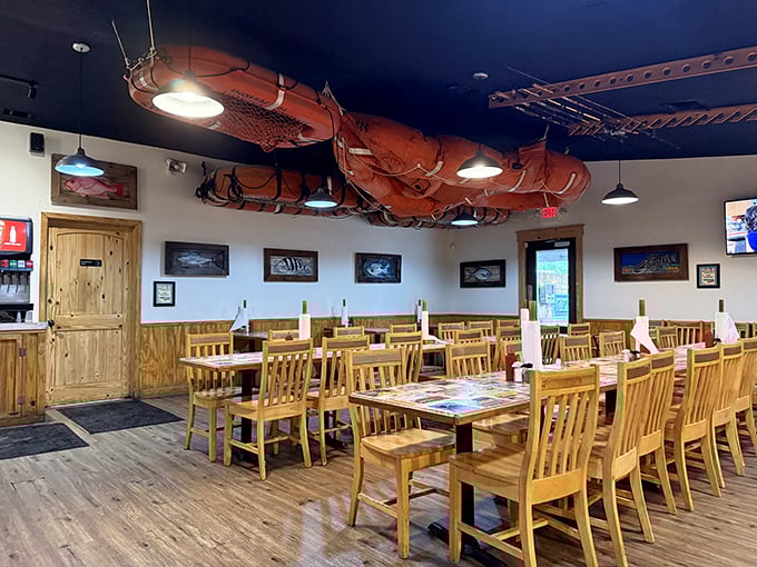 Fishing nets suspended from the ceiling aren't just decoration—they're a promise of authenticity. The wooden interior creates a maritime charm that whispers, "You're in the right place."