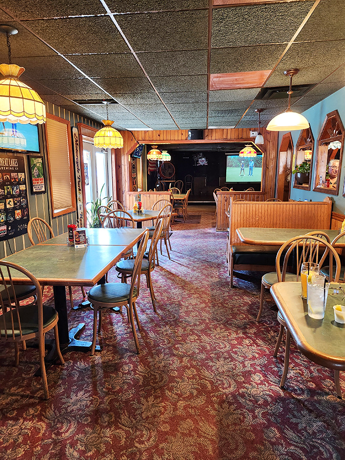 Wood paneling, Tiffany-style lamps, and comfortable booths create that perfect "everybody knows your name" vibe that chain restaurants spend millions trying to replicate.