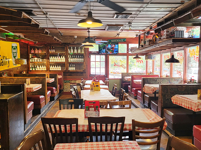 Red checkered tablecloths and wooden booths create that perfect "been-here-forever" vibe where comfort meets nostalgia. The kind of place where memories are made between bites.