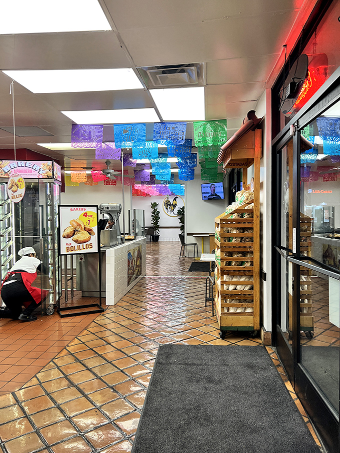 Step inside and the fiesta begins. Colorful papel picado banners dance overhead while the aroma of fresh-baked bread and sizzling meats performs a sensory salsa.