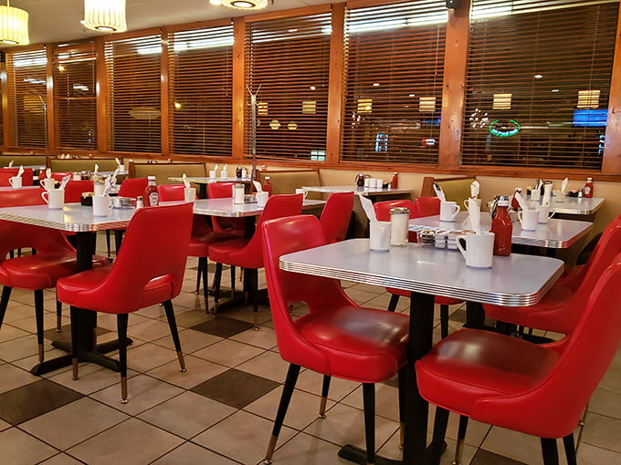 Cherry-red vinyl booths that aren't trying to be retro – they simply never left. Authenticity you can't manufacture.