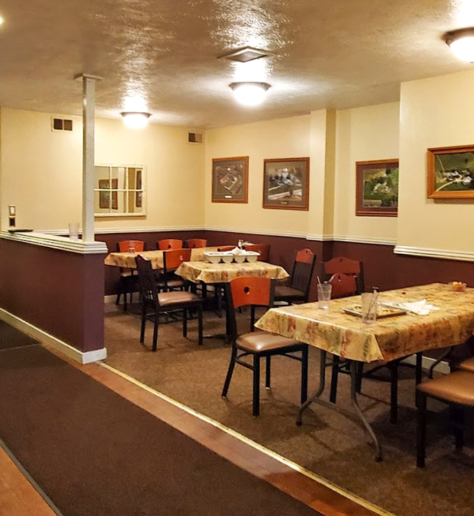 Cozy dining nooks create the perfect atmosphere for intimate conversations and memorable meals. The warm burgundy accents practically whisper, "Stay awhile."