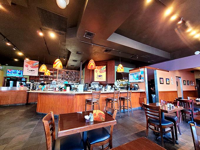 Inside, warm wood tones and pendant lighting create that perfect "neighborhood favorite" vibe – comfortable enough for regulars, welcoming enough for first-timers.