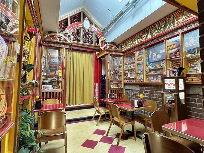 Step inside and you've entered hot dog Narnia – part vintage burlesque theater, part culinary time machine, with checkerboard floors that practically dance beneath your feet.