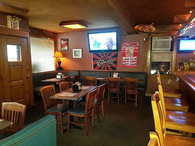 Inside, wood paneling and warm lighting create that perfect "Cheers" vibe—where everybody might not know your name yet, but they'll remember your wing order.