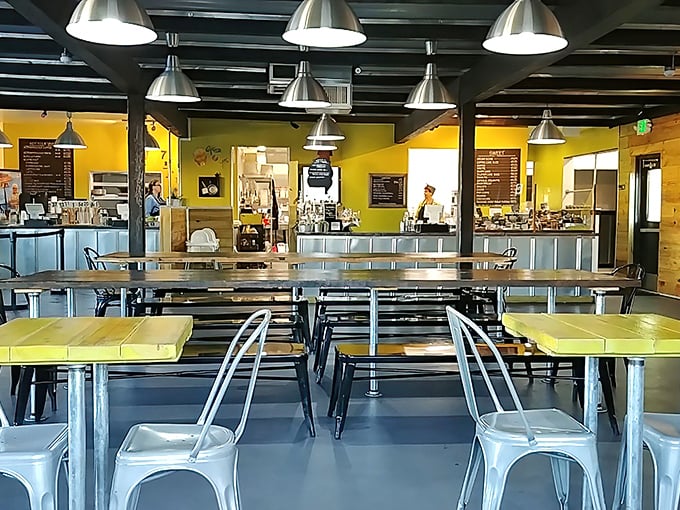 Industrial chic meets Southern hospitality inside Se7enBites, where communal tables and bright yellow walls create the perfect backdrop for breakfast revelations.