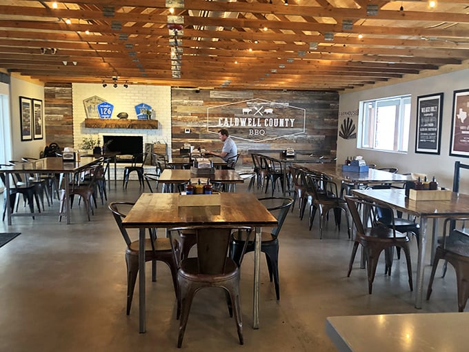 Rustic wood walls and metal chairs create that perfect "Texas-meets-Arizona" vibe. A temple of smoke where conversations flow as freely as the sweet tea.