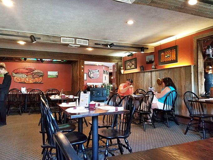 Warm wooden accents and cozy seating create that "everybody knows your name" vibe—minus Norm and Cliff, but with all the comfort you crave.
