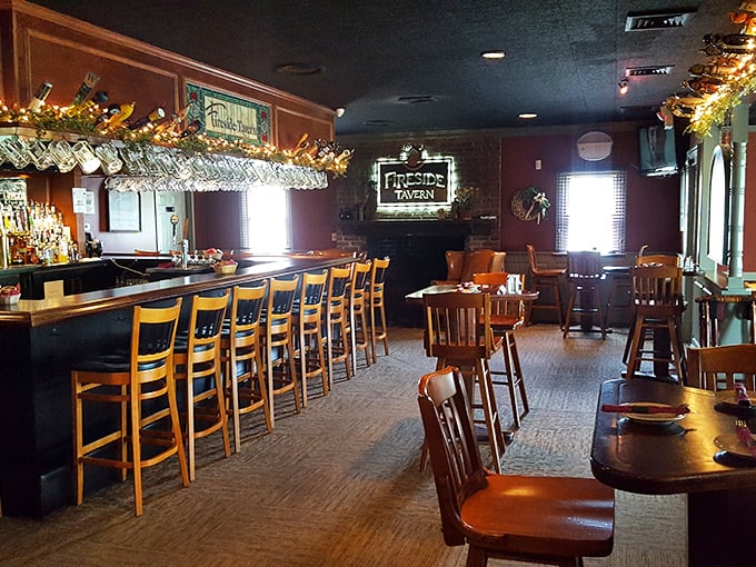The bar area beckons with warm wood tones and gleaming glassware – where strangers become friends and diet plans go to die.