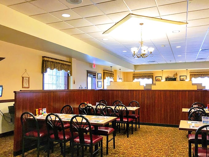 Wood paneling and warm lighting create that "grandma's dining room" vibe where calories don't count and seconds are mandatory.
