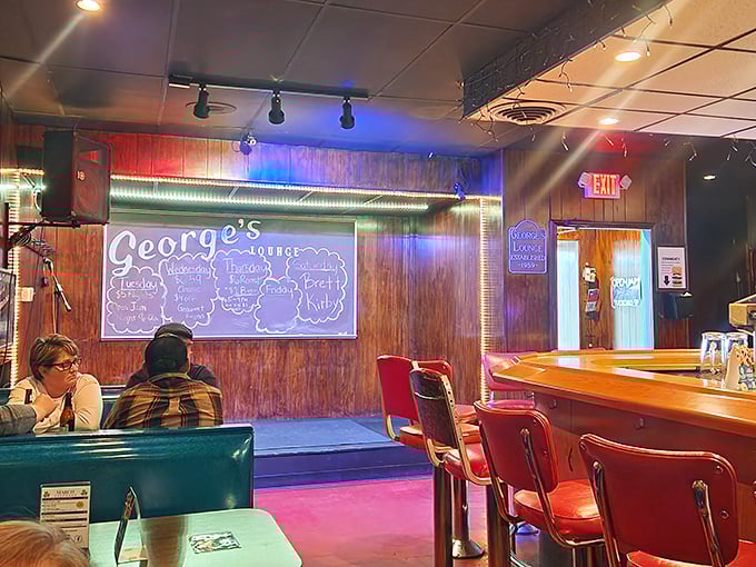 Inside, wood paneling and red vinyl stools create that perfect neighborhood tavern vibe—where conversations flow as smoothly as the craft beers on tap.