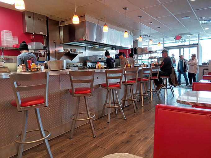The counter seating offers front-row tickets to the breakfast ballet—watch as your French toast transforms from bread to brilliance.
