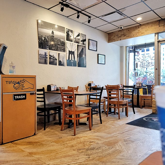 Black and white NYC photos adorn the walls, a visual appetizer preparing you for the authentic Big Apple experience about to hit your taste buds.