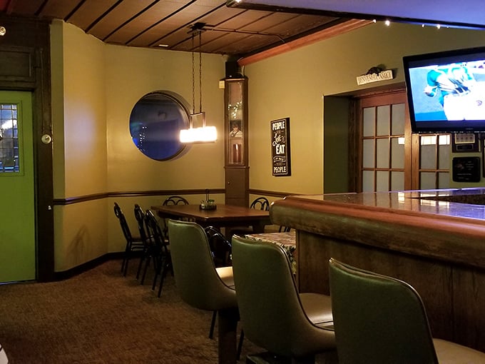 That porthole window isn't for escaping—it's for creating the perfect mood lighting for pasta-induced romance.