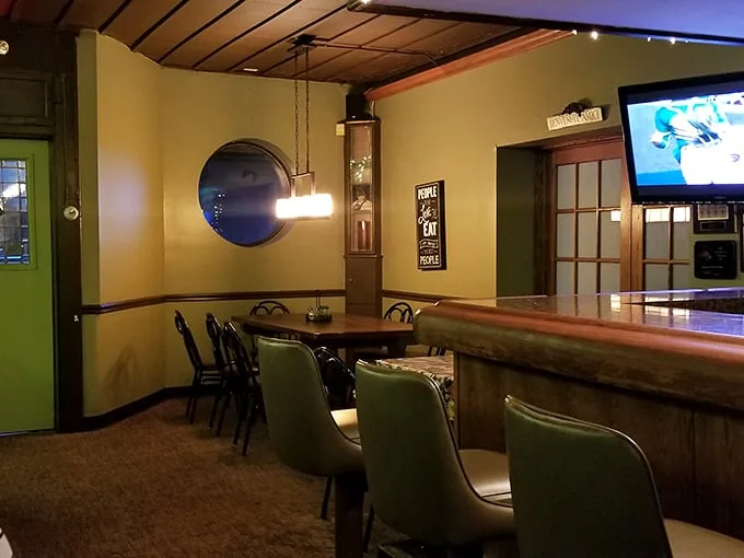 That porthole window isn't for escaping—it's for creating the perfect mood lighting for pasta-induced romance.