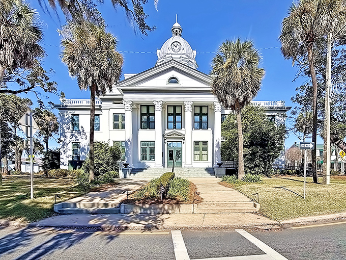 Neoclassical elegance at its finest. The Jefferson County Courthouse stands like a wedding cake in the Florida sun, complete with a clock tower that keeps everyone punctual.
