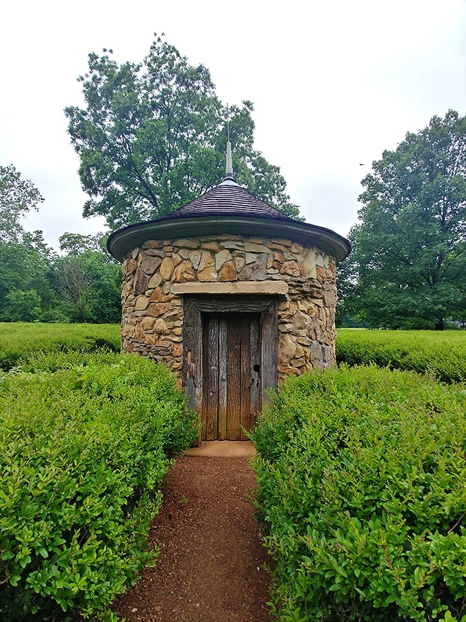 This whimsical stone structure looks like it belongs in a fairy tale. Half hobbit home, half meditation space, all charm.