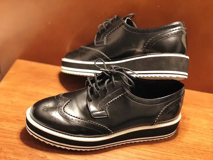 These platform wingtips aren't just shoes—they're time machines with laces. Someone's fashion loss becomes your statement piece at a fraction of retail.