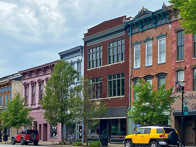 These colorful historic facades aren't just pretty faces—they're time machines disguised as storefronts, each one with stories that would fill a Ken Burns documentary.