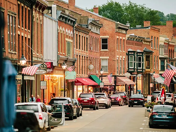 Main Street's golden hour transforms brick facades into a warm glow of Americana – like Norman Rockwell decided to design an entire downtown.