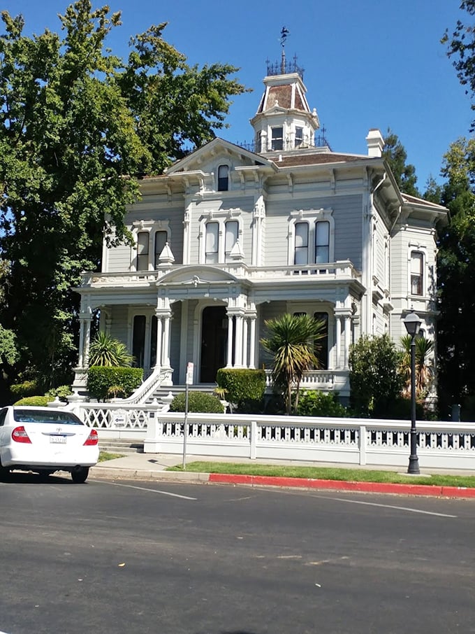 The McHenry Mansion stands as Modesto's Victorian grande dame, her white columns and ornate details whispering tales of California's past to anyone who'll listen.
