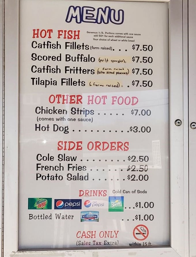 The menu board speaks the universal language of "no-nonsense deliciousness." Farm-raised catfish and wild-caught buffalo await your decision.