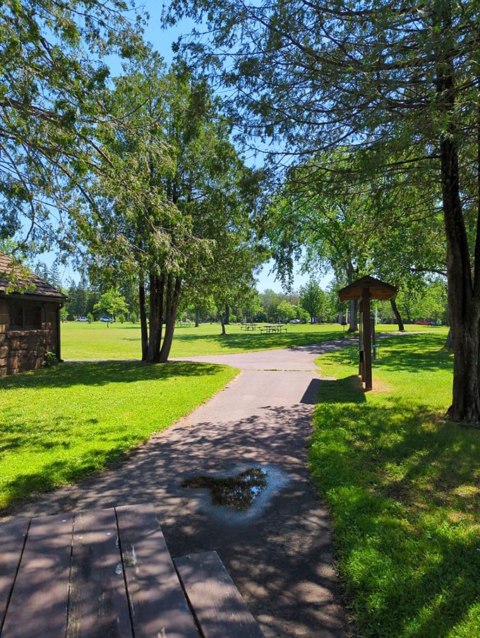 Winding paths through sun-dappled greenery invite exploration. This is the kind of place where cell phones mysteriously lose reception, but nobody seems to mind.