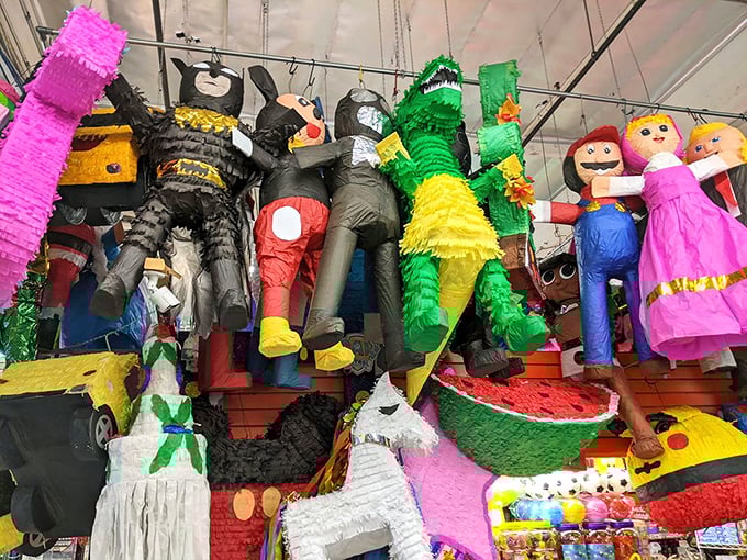 Piñatas hang like colorful sentinels, ready to transform any ordinary gathering into a celebration worth remembering.
