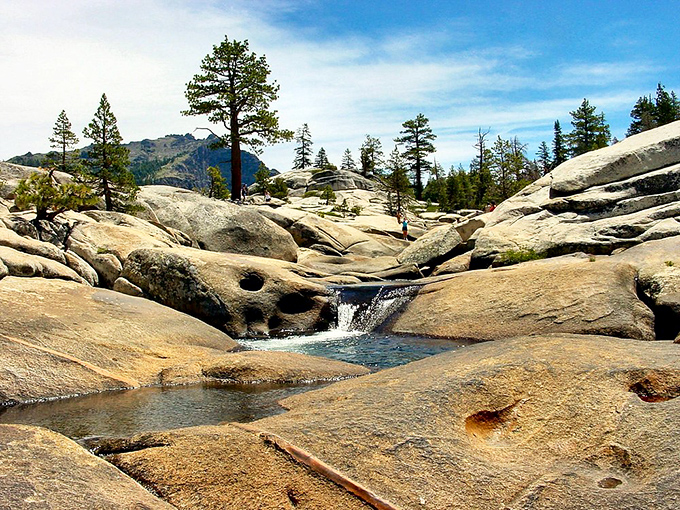 Mother Nature's plumbing at its finest. Crystal clear mountain water carves its way through ancient granite, creating natural pools perfect for a refreshing dip.