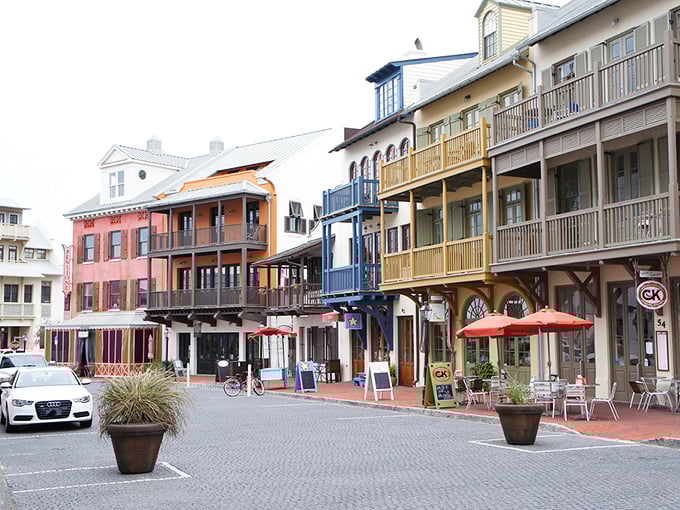 A rainbow of colorful buildings lines the pedestrian-friendly streets, where cars seem like reluctant visitors in a town designed for human-powered exploration.