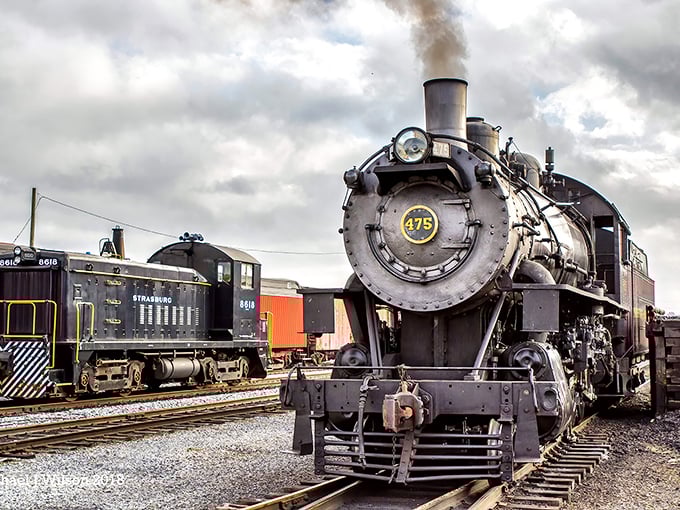 Engine 475 stands proud, its polished brass gleaming against the moody sky – a mechanical masterpiece that's seen more of America than most of us ever will.
