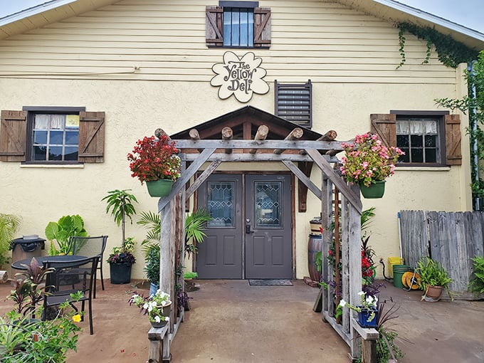 The Yellow Deli welcomes with rustic charm and hanging flower baskets – like stepping into your eccentric aunt's cottage garden.