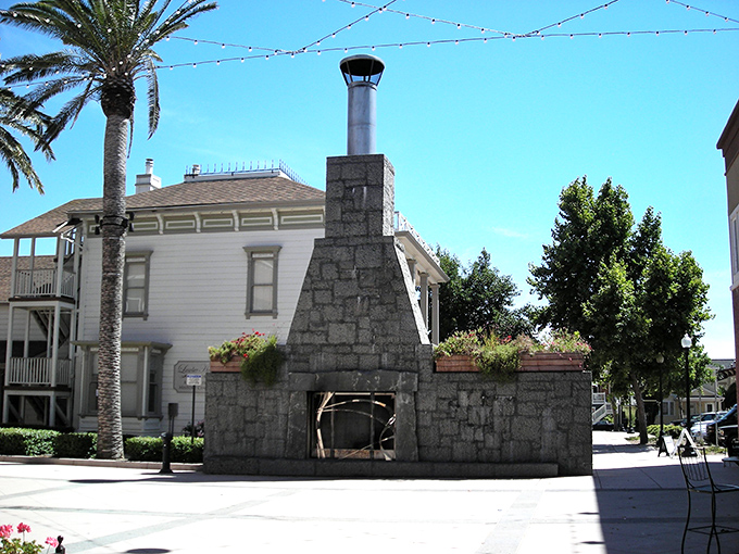 This isn't just a fireplace—it's the community's hearth, where strangers become neighbors and cold evenings transform into warm memories. 