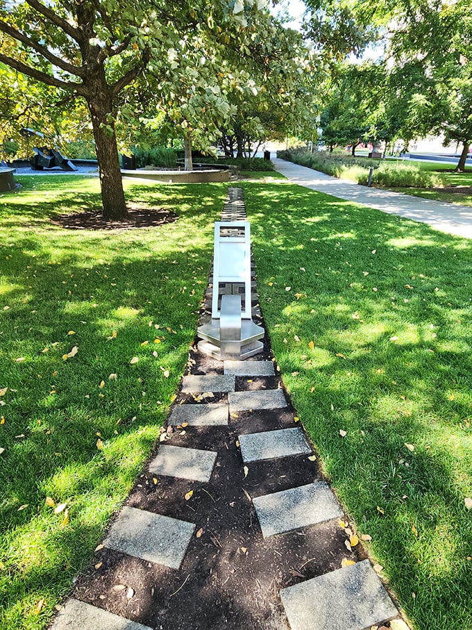 A geometric pathway leads visitors through Citygarden's verdant landscape. These stepping stones feel like following the yellow brick road, but with more artistic flair.