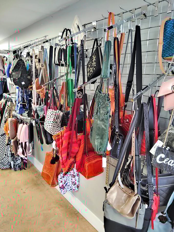 This handbag wall could make Carrie Bradshaw weep with joy – organized chaos that somehow makes perfect sense.