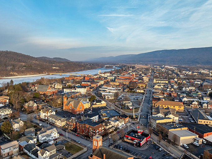 From above, Lock Haven reveals its perfect positioning between rolling Pennsylvania mountains and the winding Susquehanna River—nature's version of a protective hug.