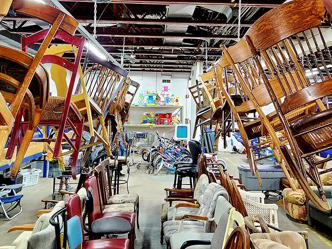 Chair heaven or organized chaos? This furniture forest is where vintage oak meets mid-century modern in a gathering that spans decades of sitting history.