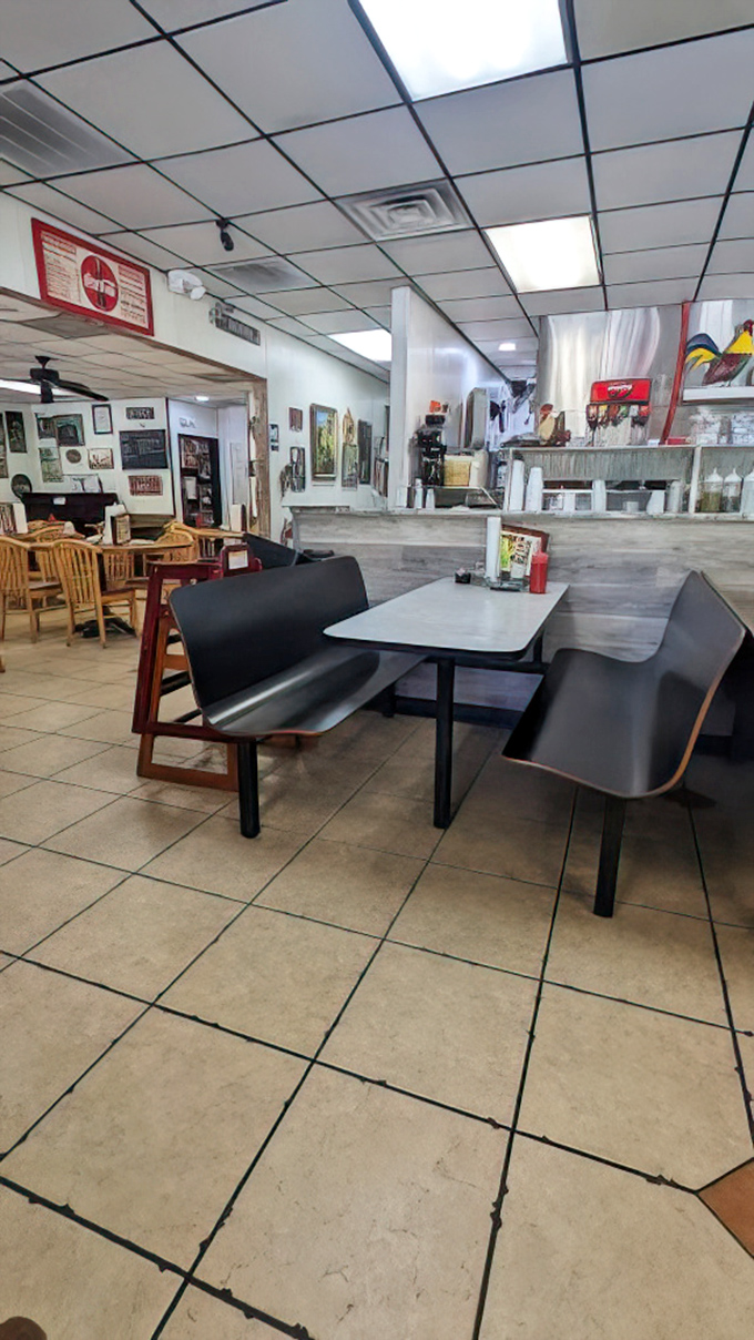 Inside, classic diner simplicity reigns supreme. Those black vinyl booths have witnessed countless coffee refills and life-changing pie decisions.