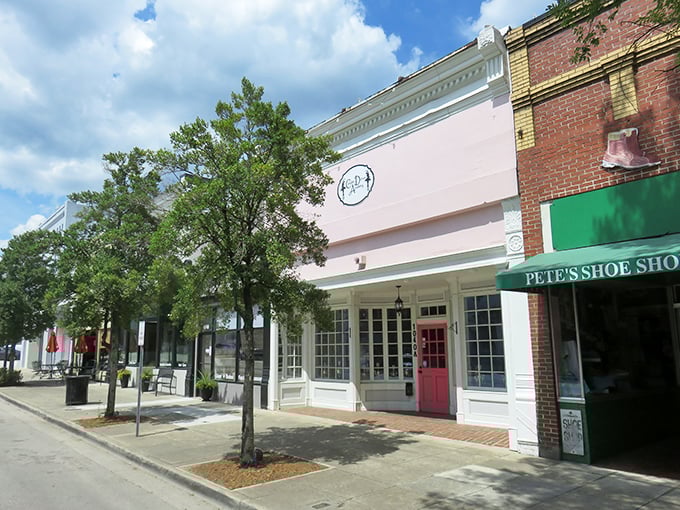 Downtown storefronts blend historic architecture with modern businesses, creating a shopping district where your dollar stretches further and shopkeepers remember your name.