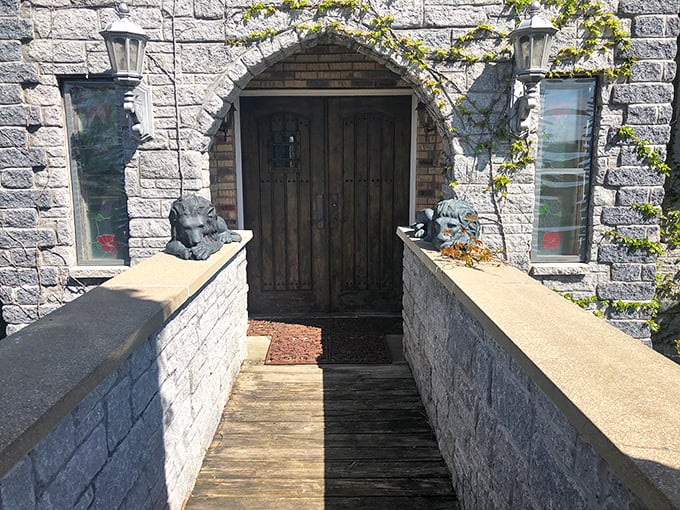 The entrance beckons with all the drama of a fantasy novel's first chapter—stone gargoyles standing guard as if protecting ancient secrets within.