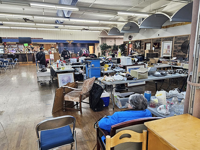 Inside, fluorescent lights illuminate decades of memories for sale. That chair might have stories to tell—if only it could talk!