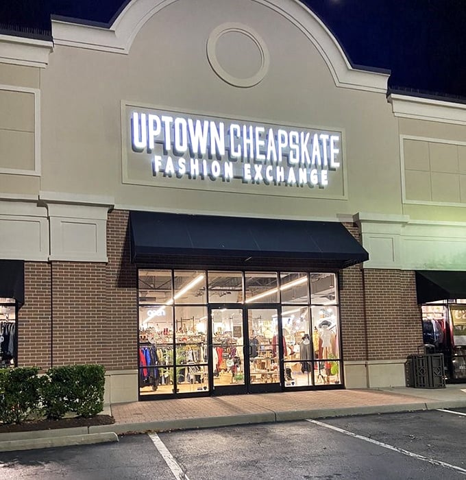 Night or day, this fashion oasis glows with possibility. The illuminated sign serves as a lighthouse guiding style-seekers to safe harbor from retail price storms.