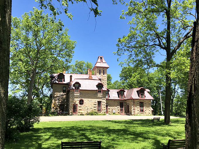 Nestled among ancient trees, this limestone beauty looks like it was teleported from the European countryside. Downton Abbey, Ohio edition!