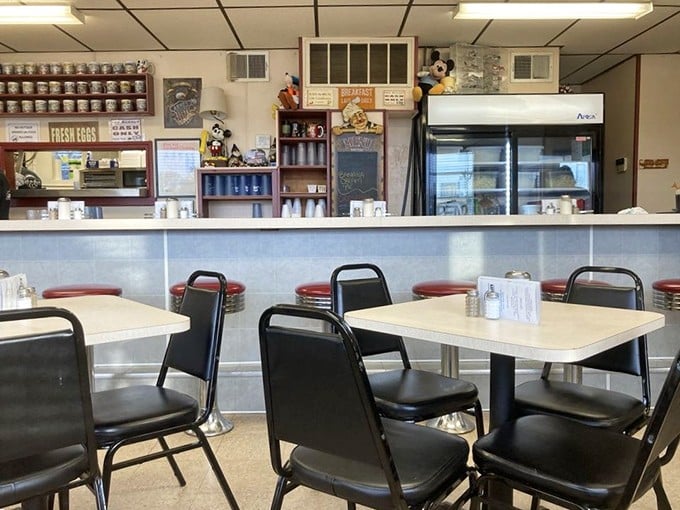 Classic diner simplicity at its finest—where formica tables and vinyl chairs set the stage for extraordinary comfort food experiences.