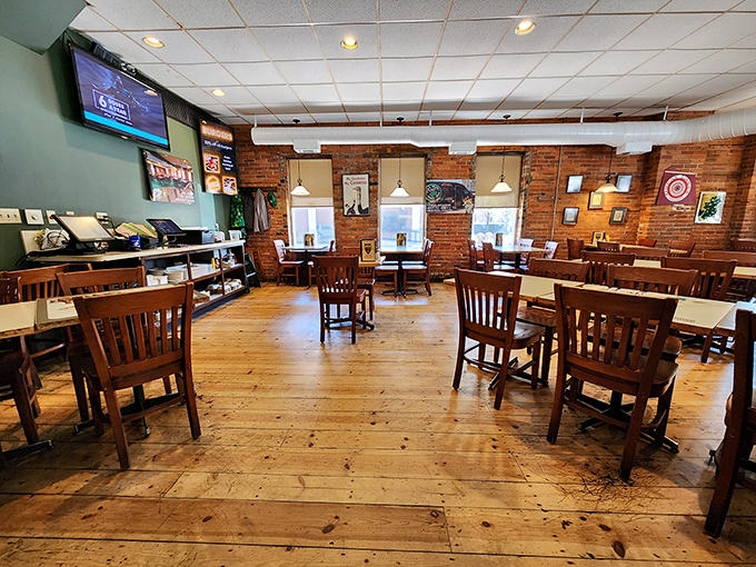 Exposed brick walls and wooden floors create the perfect backdrop for serious comfort food conversations.