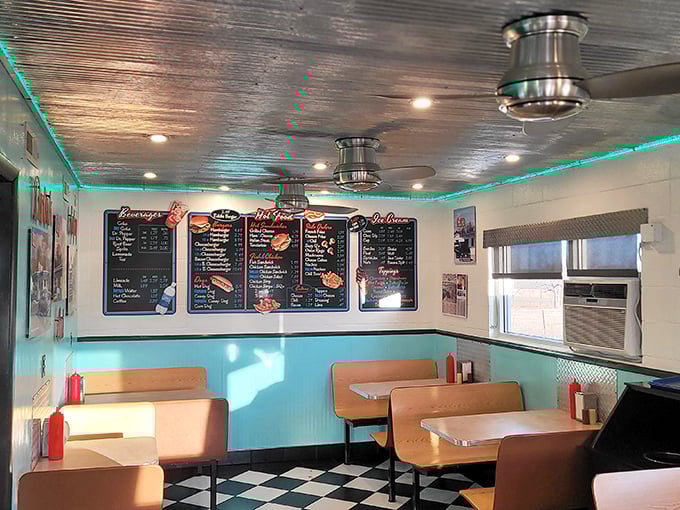Step inside and the turquoise walls, checkered floor, and neon-trimmed ceiling transport you to a simpler time when booths were vinyl and menus were handwritten.