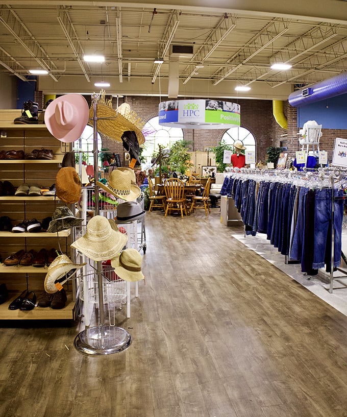A wonderland of organization awaits inside, where hats bloom like flowers and denim lines up with military precision.