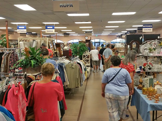 Shoppers navigate the labyrinth of merchandise, where every aisle tells a different story and every rack holds potential discoveries.