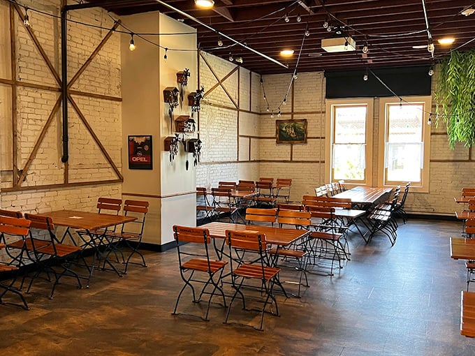 Step inside to find a dining room that channels authentic German beer hall vibes with rustic wooden tables and white brick walls—Gemütlichkeit in Florida.