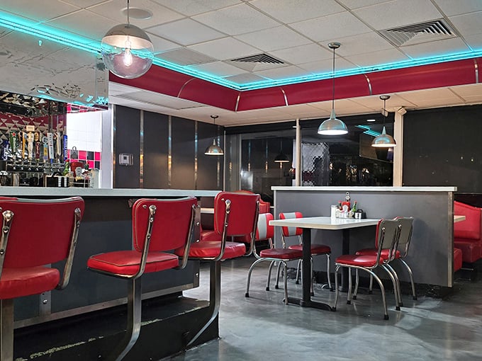 Those red vinyl booths aren't just seating—they're time machines to when conversation was the only social media that mattered.